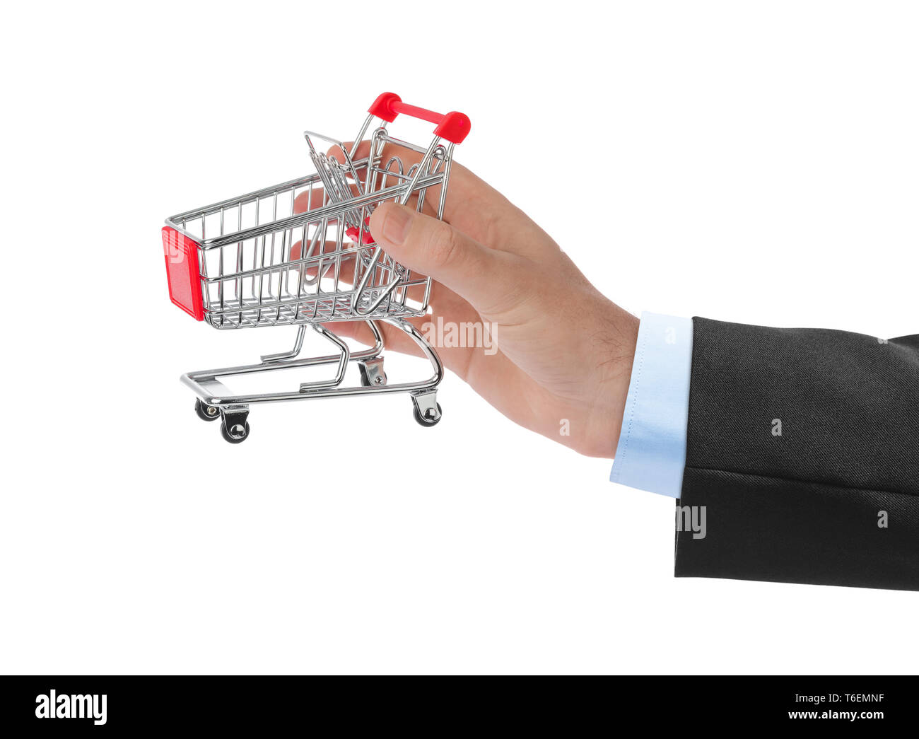 Hand with shopping cart Stock Photo - Alamy