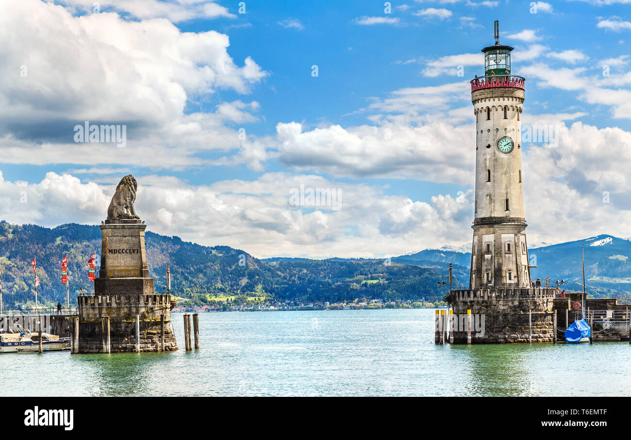 Harbor entrance with lighthouse and lion statue hi-res stock ...
