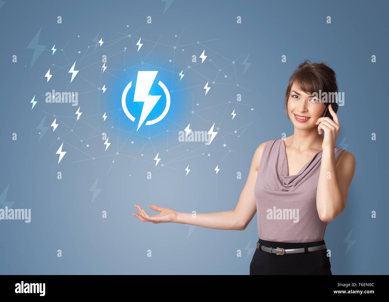 Young smiling person presenting battery life concept Stock Photo - Alamy