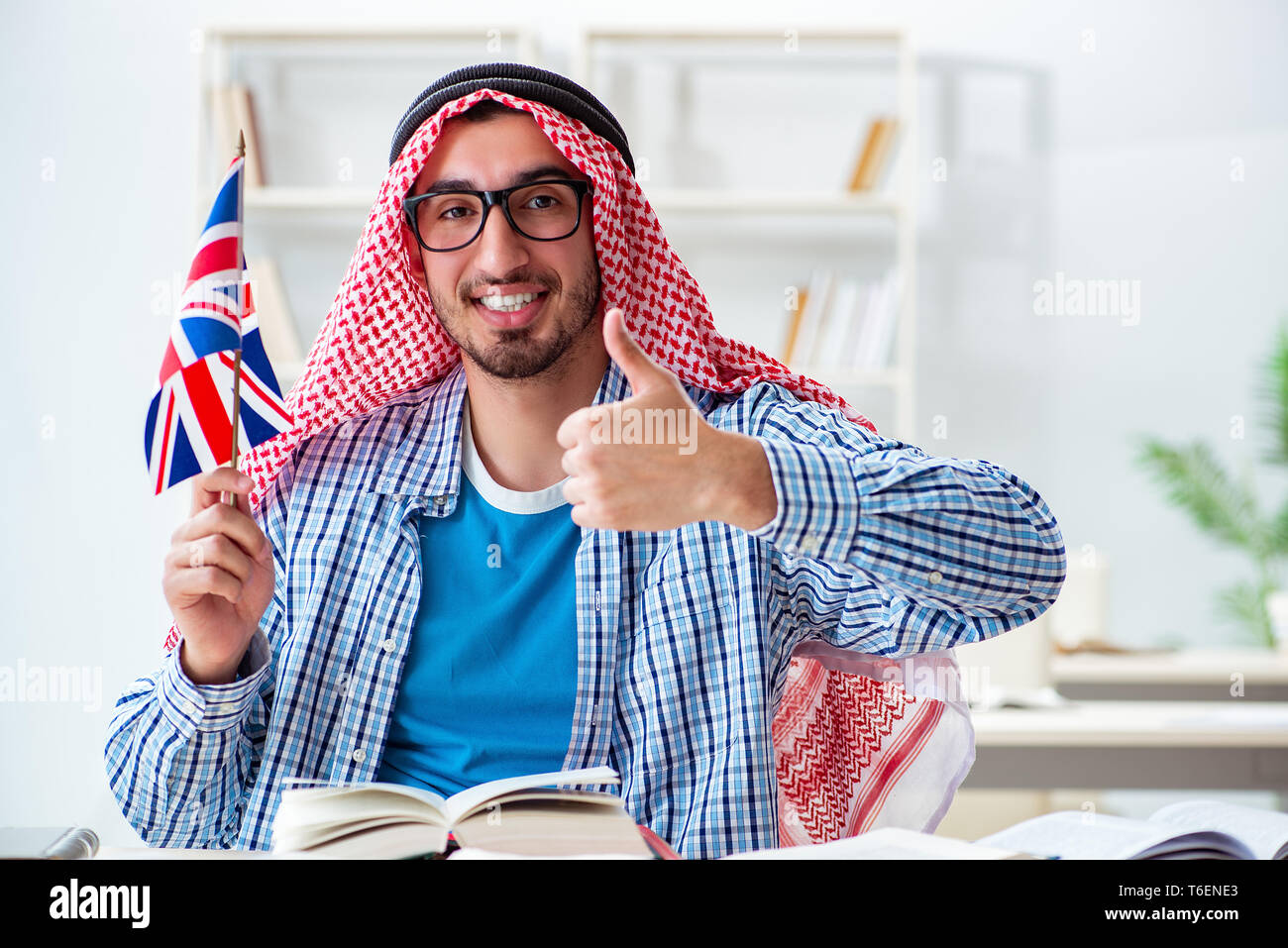 Arab student studying english language Stock Photo - Alamy