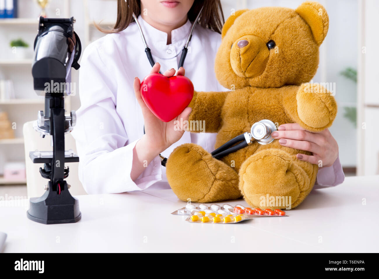 Child checking soft toy health Stock Photo - Alamy