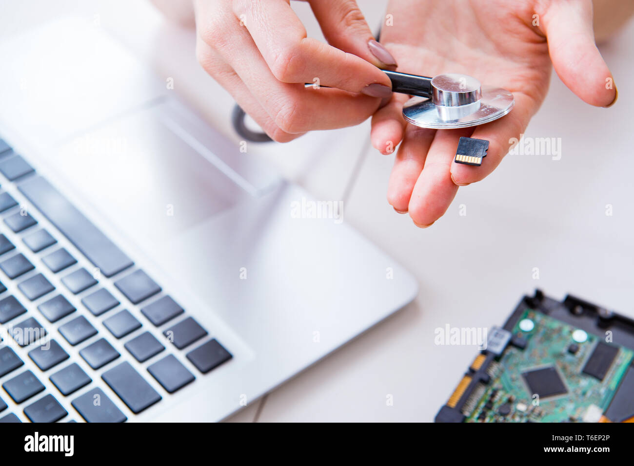Hard drive repair and data recovery with restoration Stock Photo - Alamy