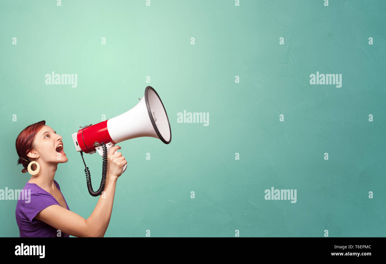 Person speaking in loudspeaker Stock Photo - Alamy