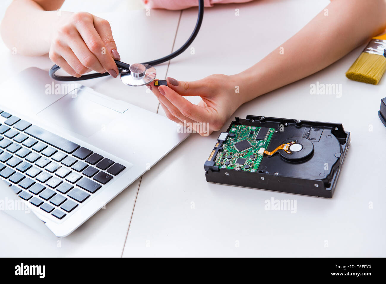 Hard drive repair and data recovery with restoration Stock Photo - Alamy