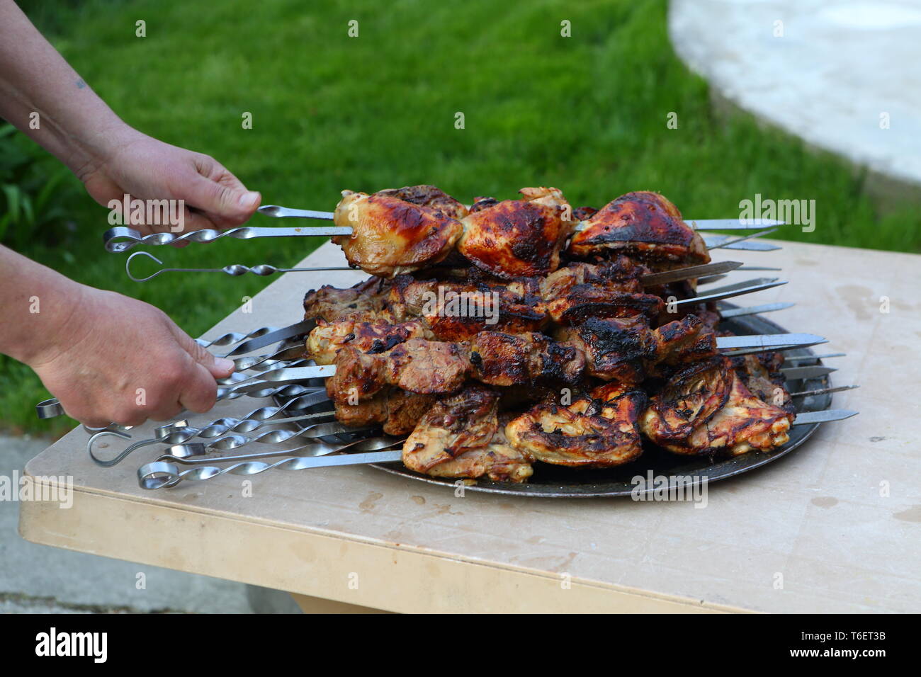 Mens hands cook chicken meat hi-res stock photography and images - Alamy