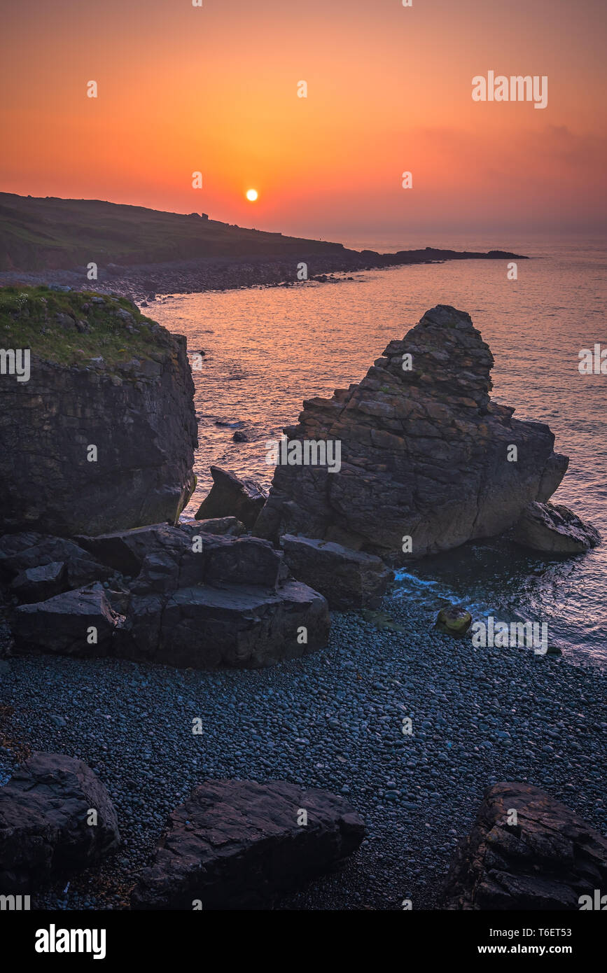 Sunset over the Cornish coast Stock Photo - Alamy