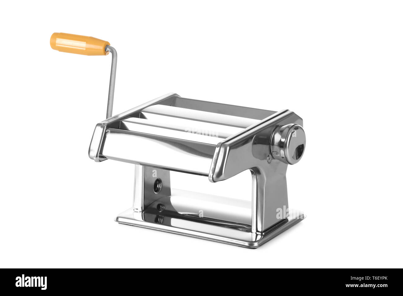 Metal pasta machine on white background Stock Photo - Alamy