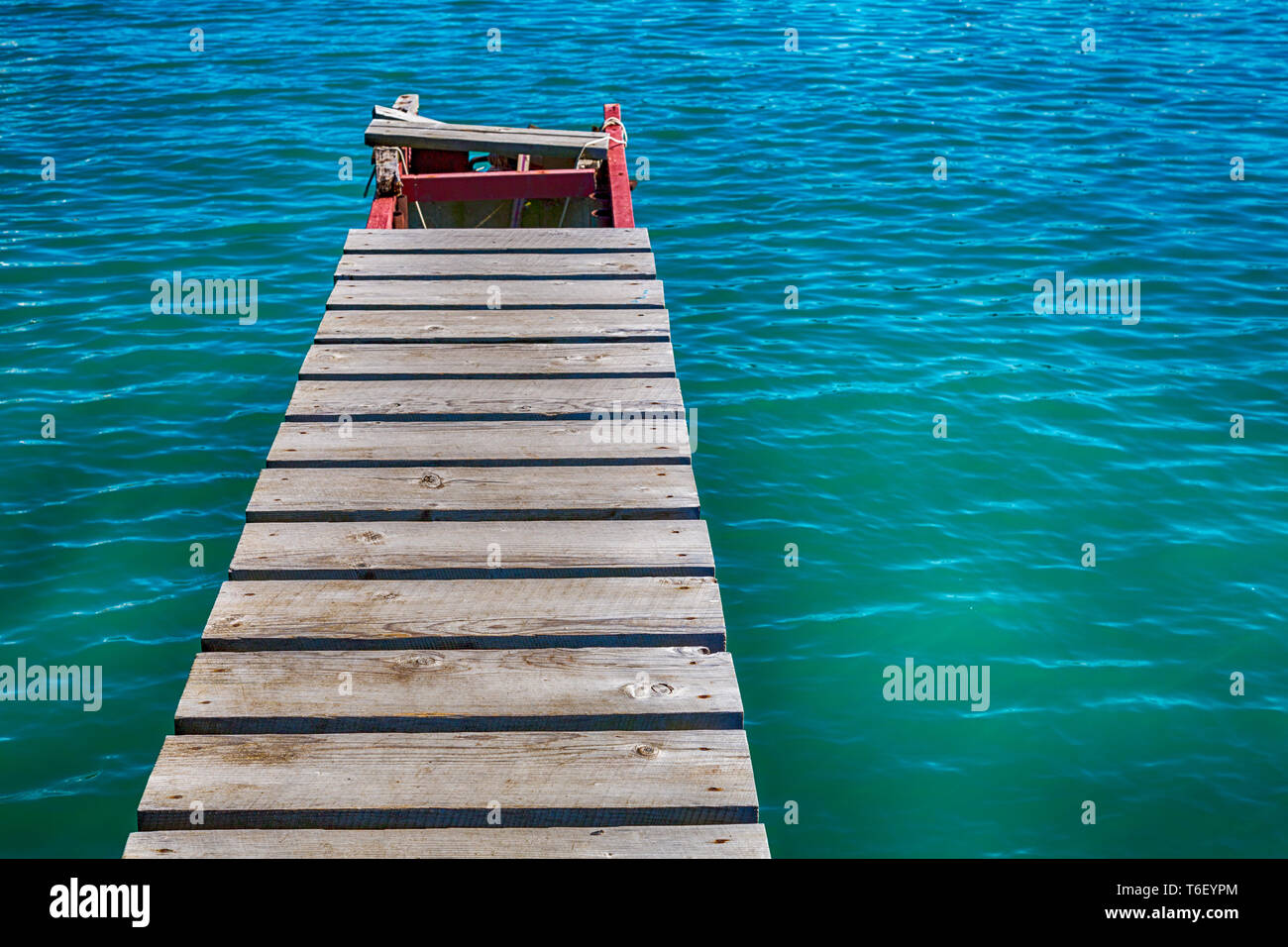Wooden wharf above the water Stock Photo - Alamy