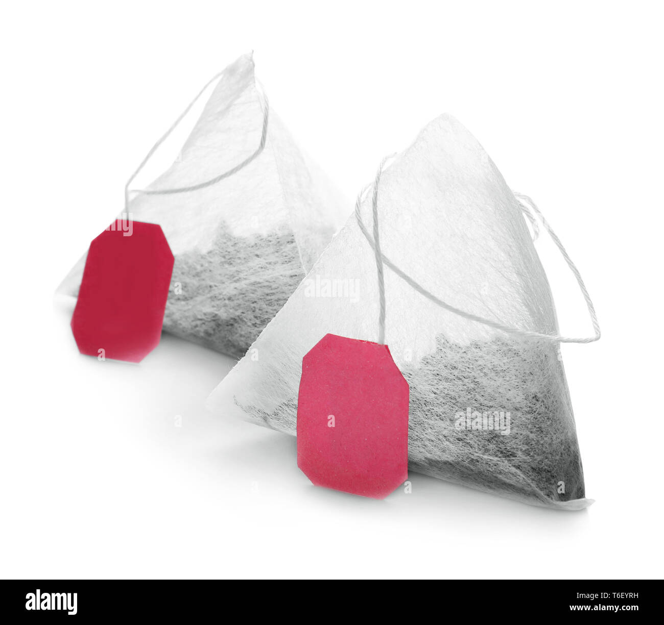 Tea bags on white background Stock Photo - Alamy