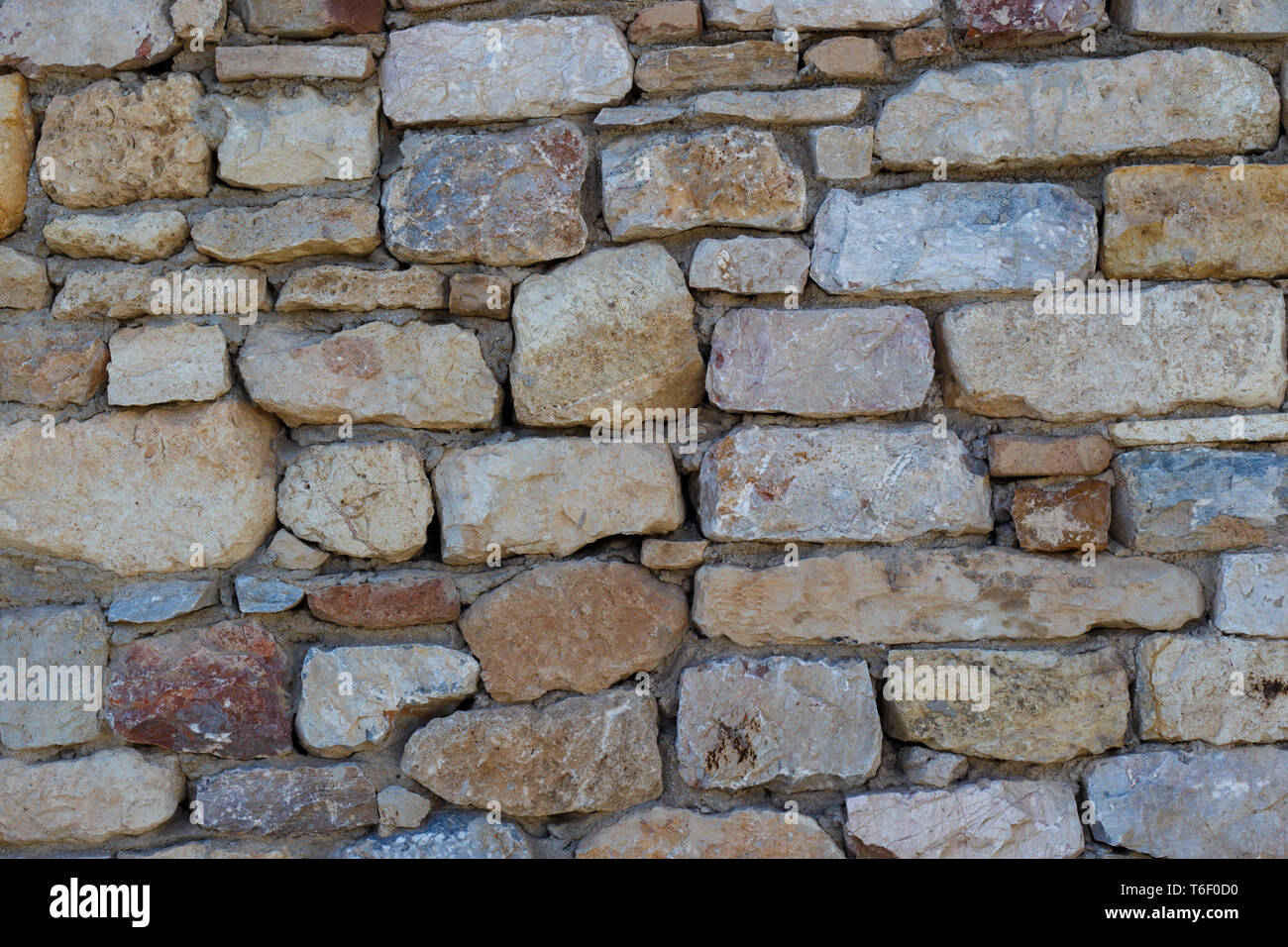 Natural stone wall texture Stock Photo - Alamy