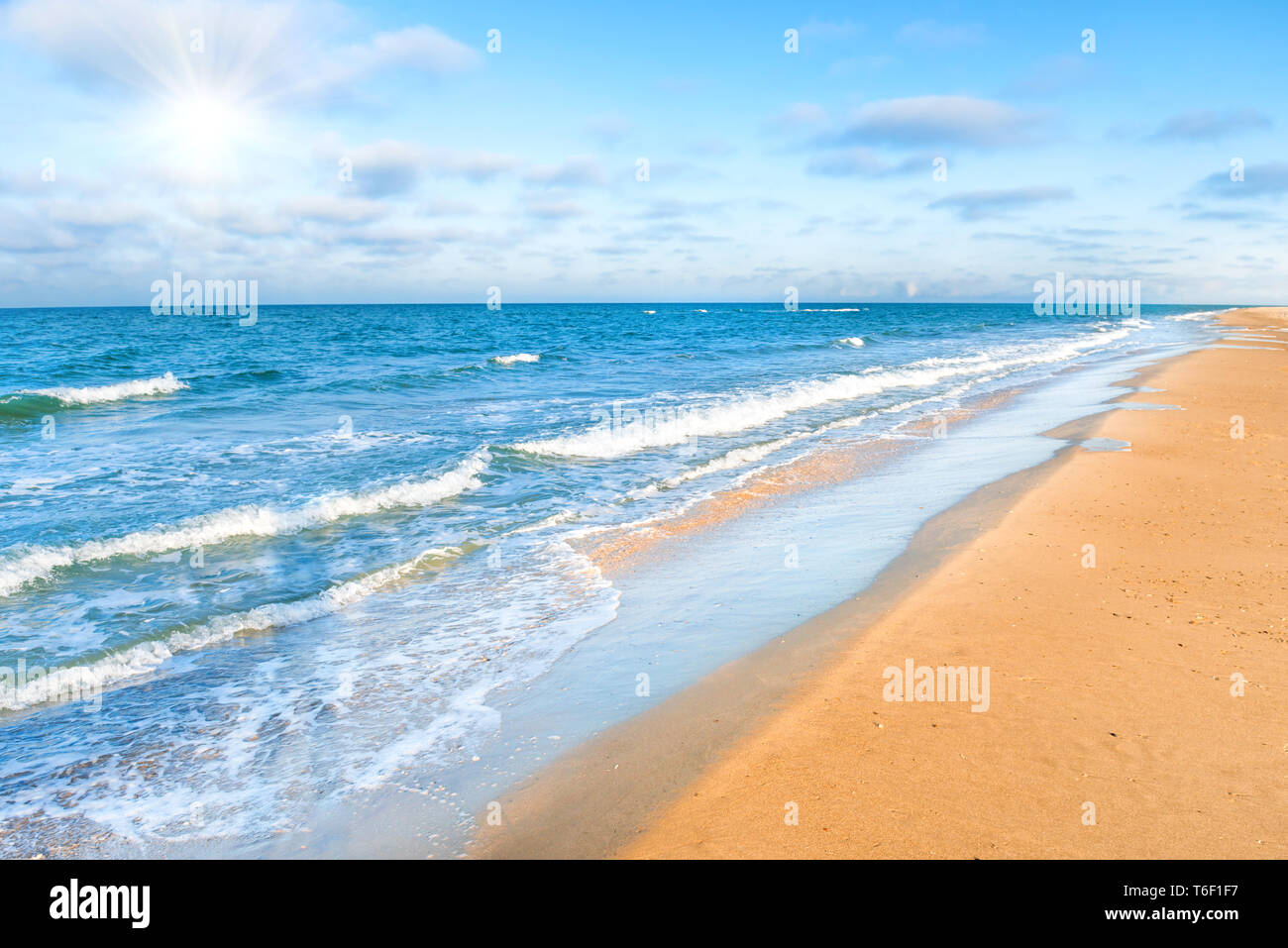 Long tropical sandy beach Stock Photo - Alamy
