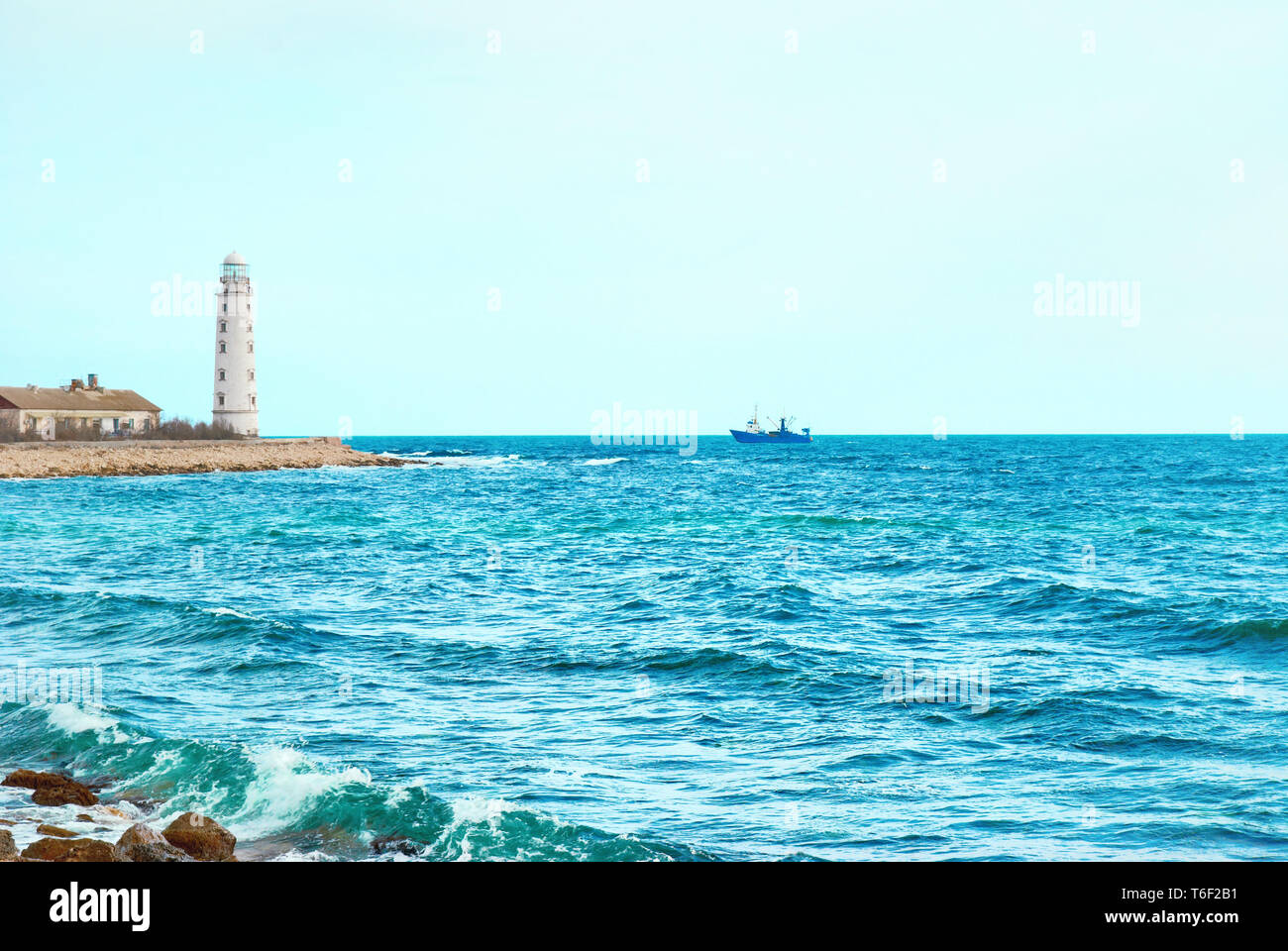 Sun lighthouse on coast hi-res stock photography and images - Alamy