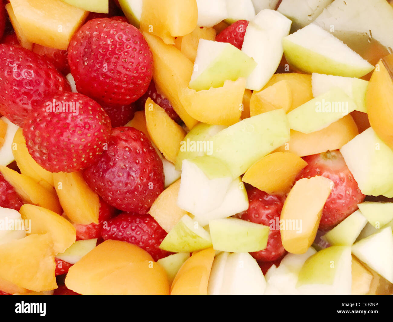Cut fresh fruit background Stock Photo - Alamy