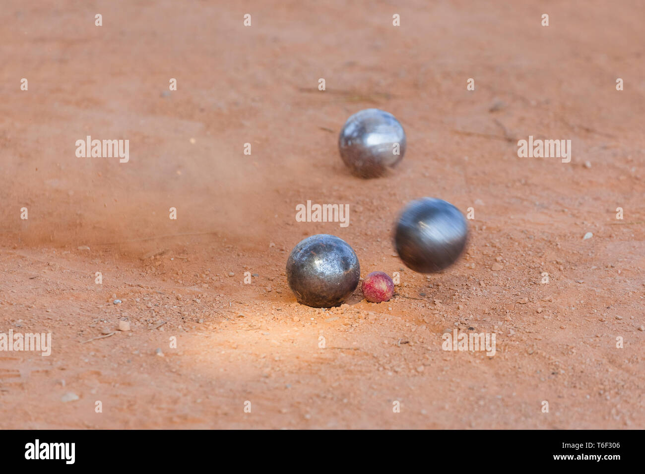 Petanque balls on the ground Stock Photo - Alamy
