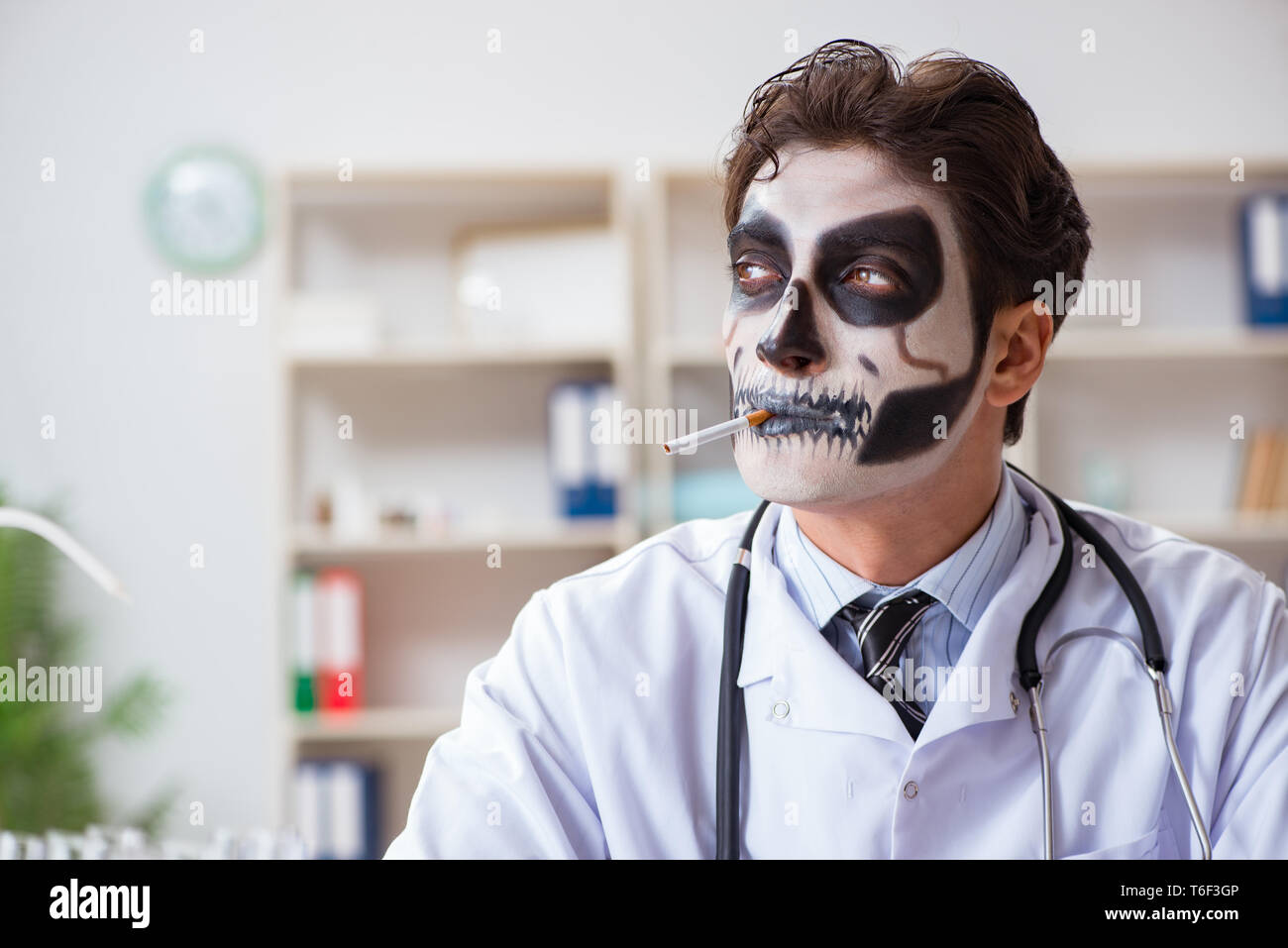 Scary monster doctor working in lab Stock Photo - Alamy