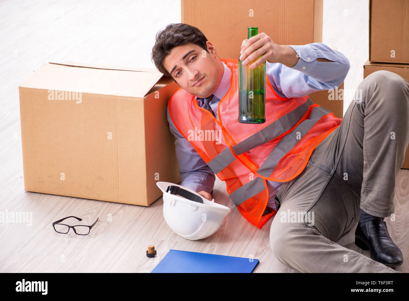 Delivery man drunk at work Stock Photo - Alamy