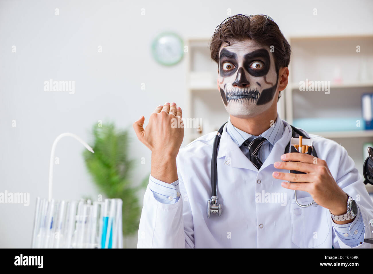 Scary monster doctor working in lab Stock Photo - Alamy