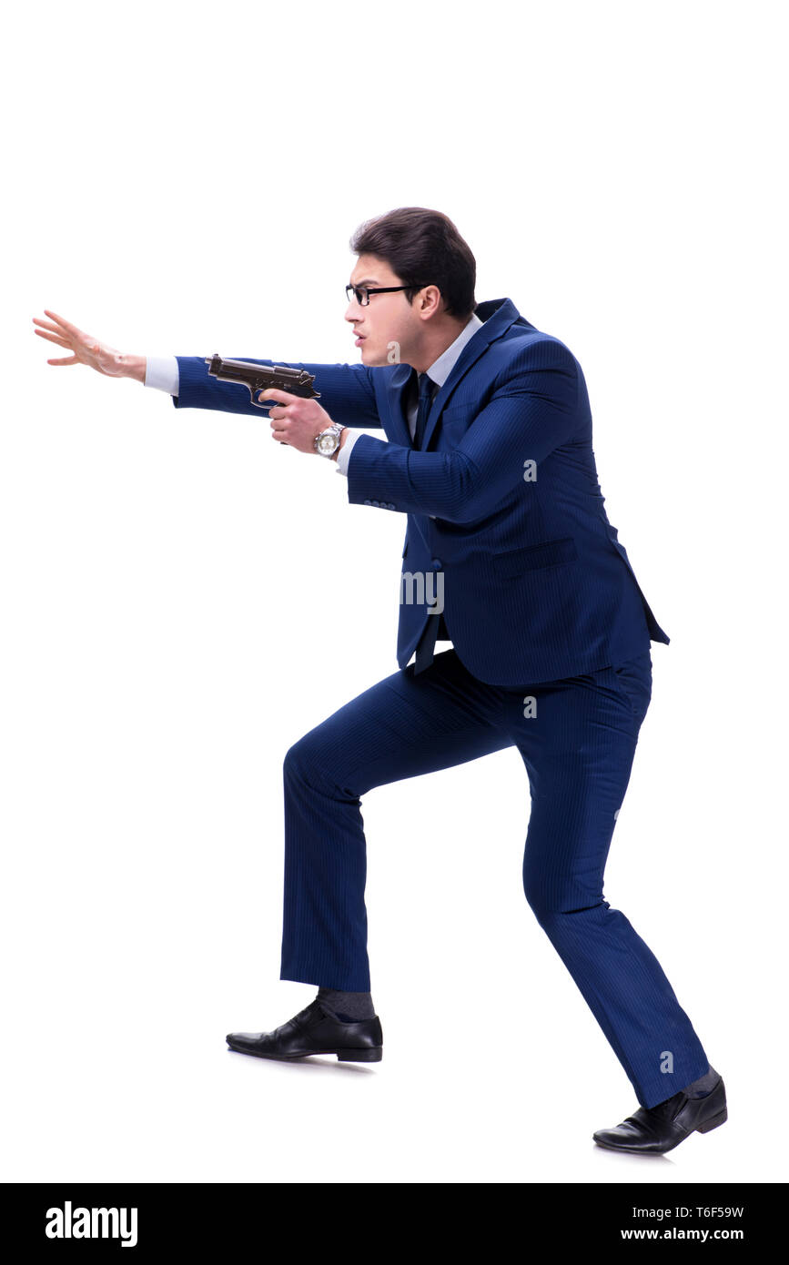 Businessman with gun isolated on white background Stock Photo - Alamy