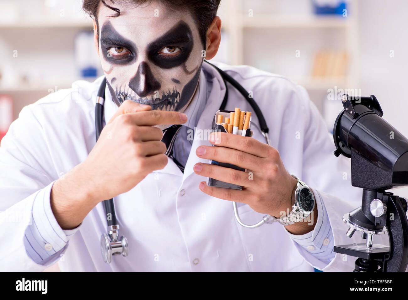 Scary monster doctor working in lab Stock Photo - Alamy