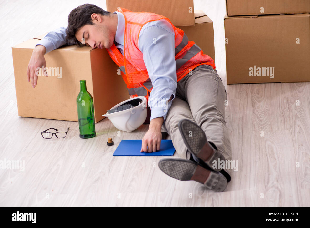 Delivery man drunk at work Stock Photo - Alamy