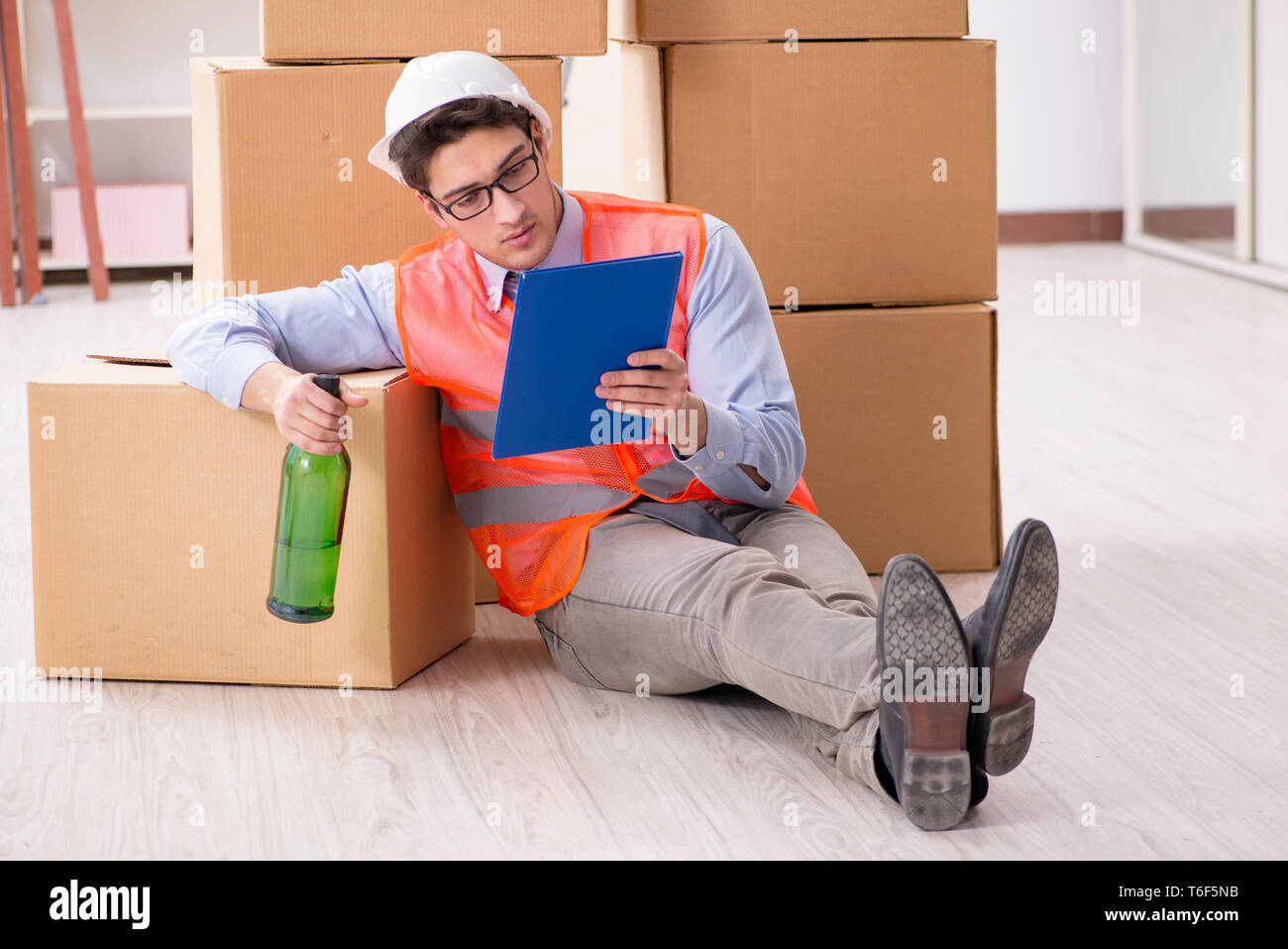 Delivery man drunk at work Stock Photo - Alamy