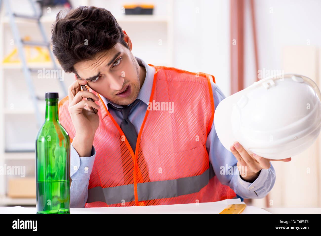 Mechanic businessman talking workshop hi-res stock photography and ...