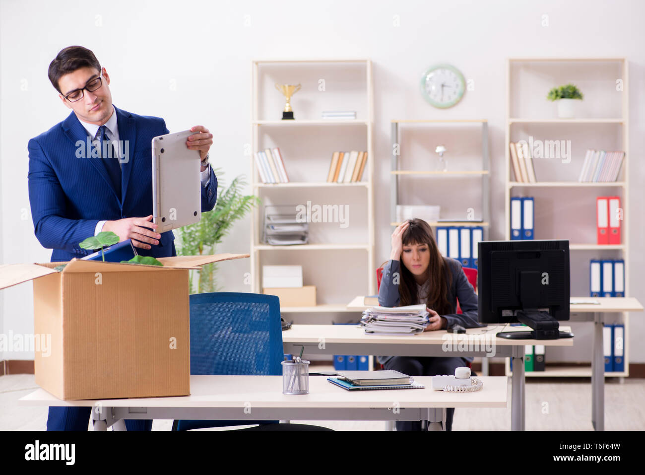 Person being fired from his work Stock Photo - Alamy