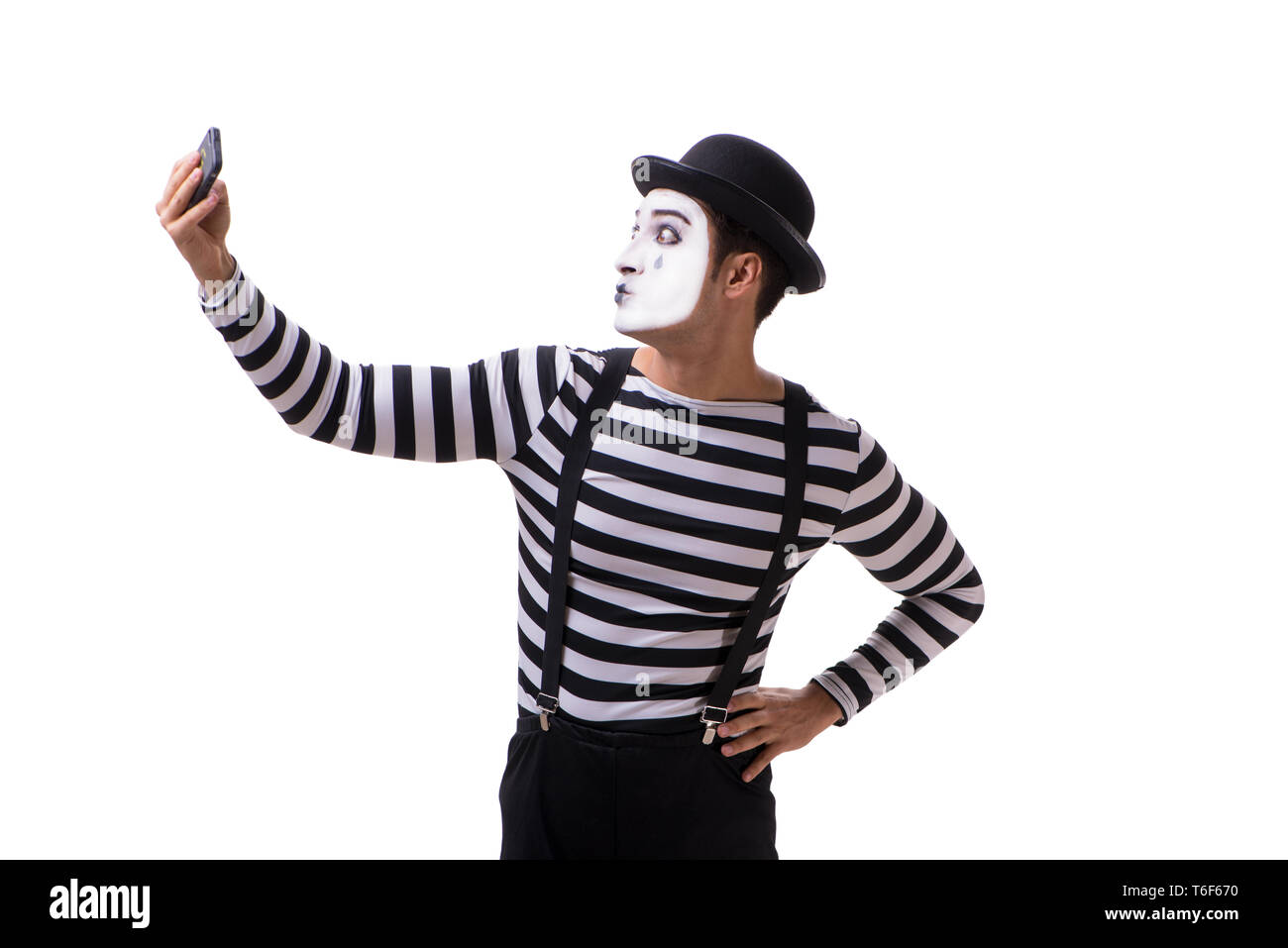 Mime with smartphone isolated on white background Stock Photo - Alamy