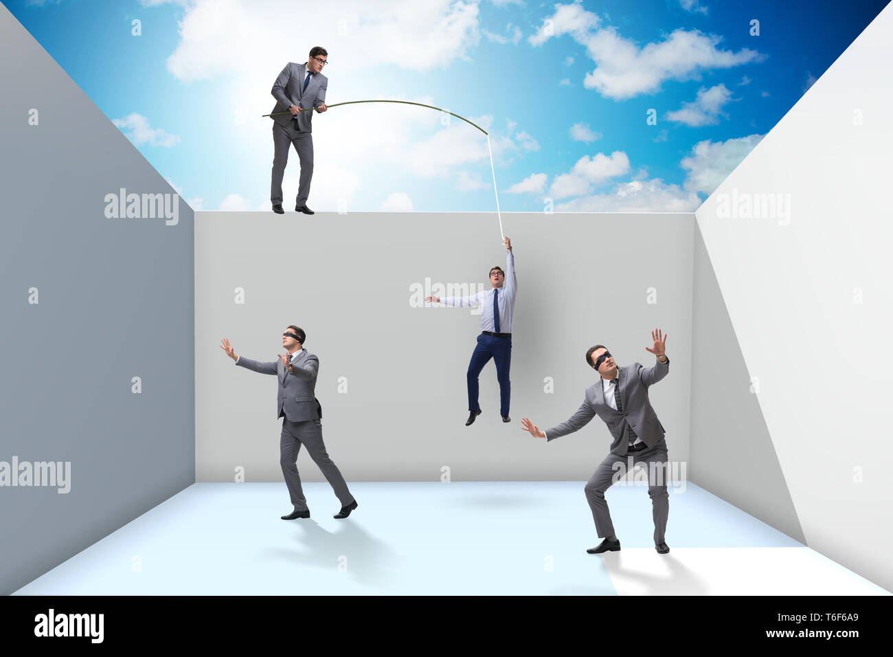 Businessman fishing his colleague in business concept Stock Photo - Alamy