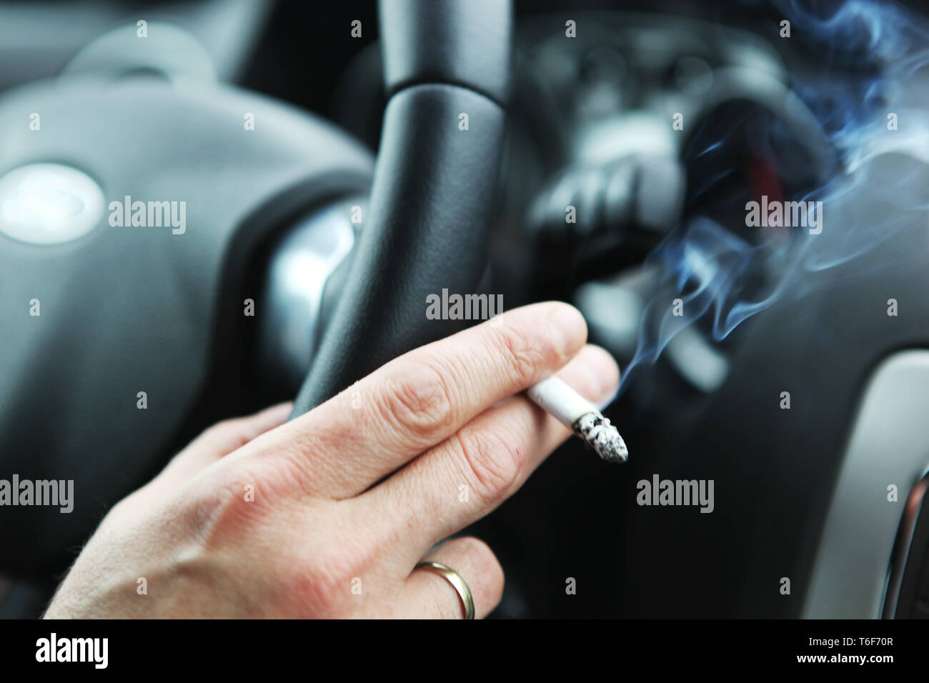Men smoking in car Stock Photo - Alamy