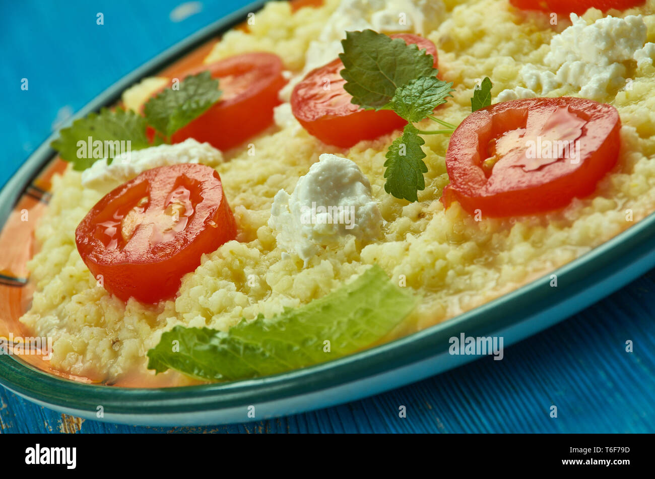 Millet risotto with pesto Stock Photo - Alamy
