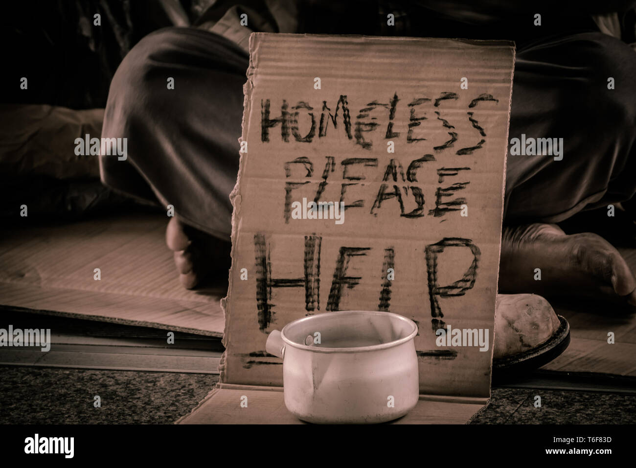 Homeless. Unhappy homeless man asking help for food donation from the ...