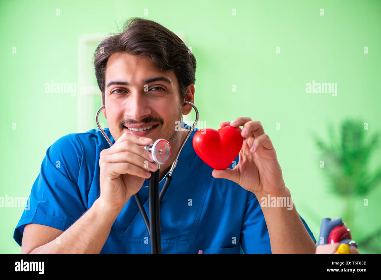 Doctor student explaining heart problems Stock Photo - Alamy