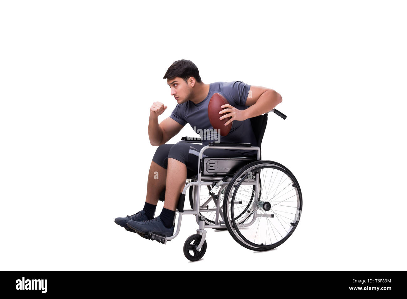 Football player recovering from injury on wheelchair Stock Photo - Alamy