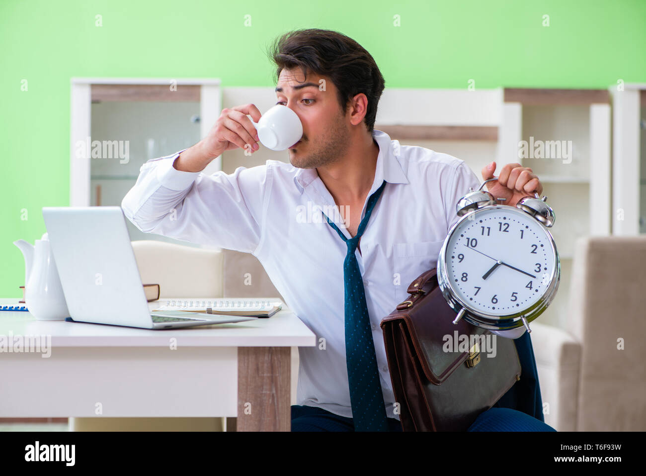 Man dressing up and late for work Stock Photo - Alamy