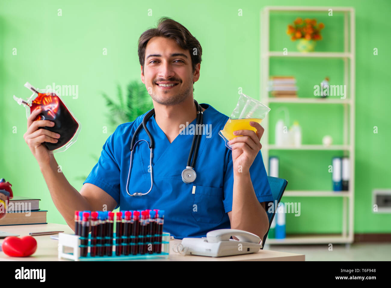 Doctor doing blood analysis in the lab Stock Photo - Alamy