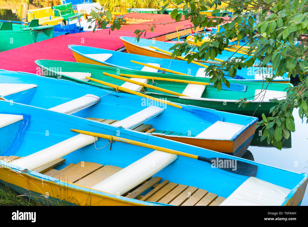 Colorful wooden fishing boats docked hi-res stock photography and ...
