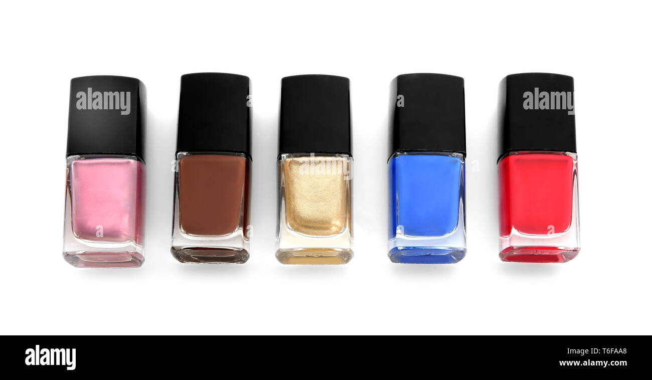 Collection of nail polish on white background Stock Photo - Alamy