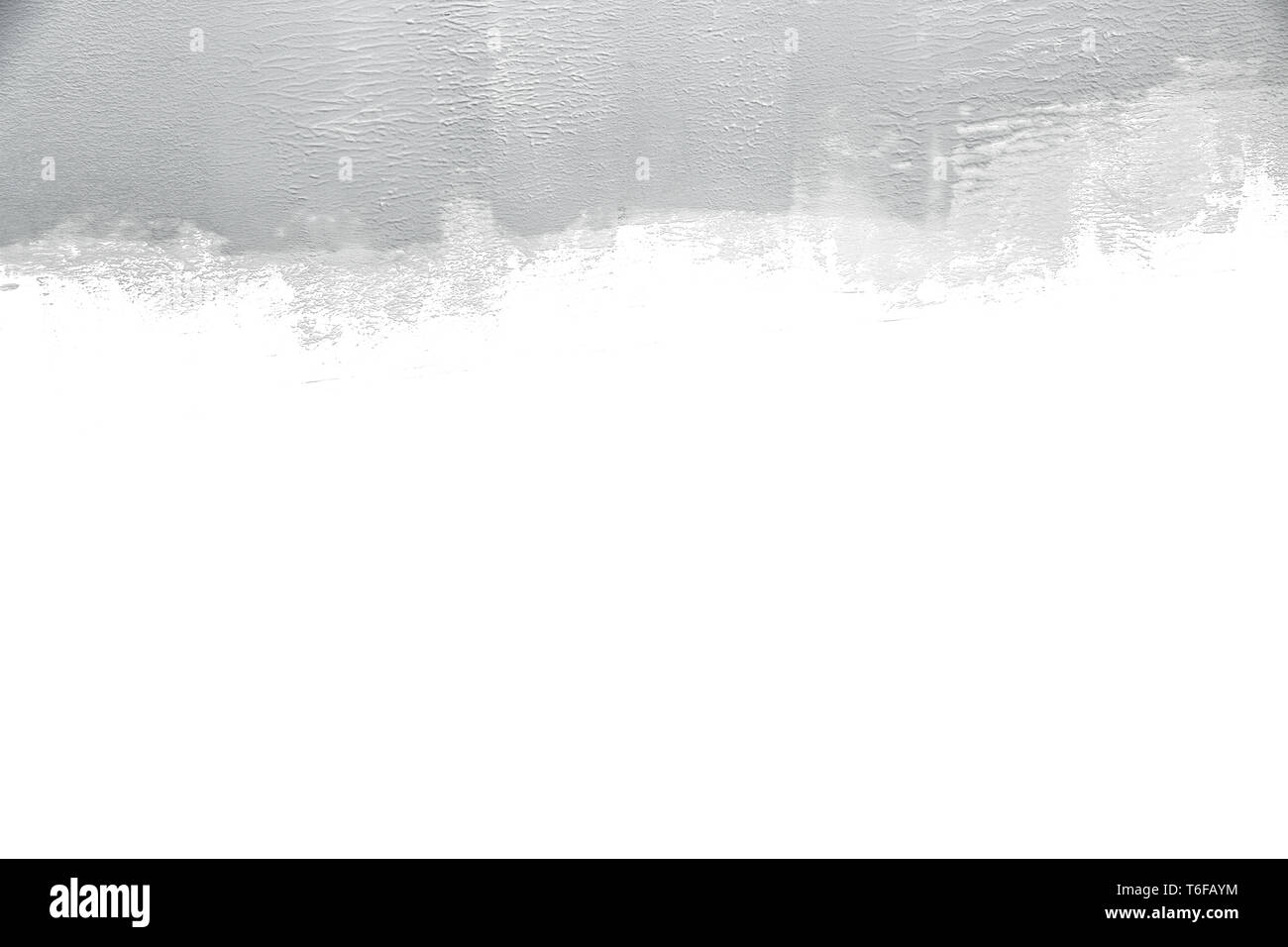 Wall partially painted in grey color Stock Photo - Alamy