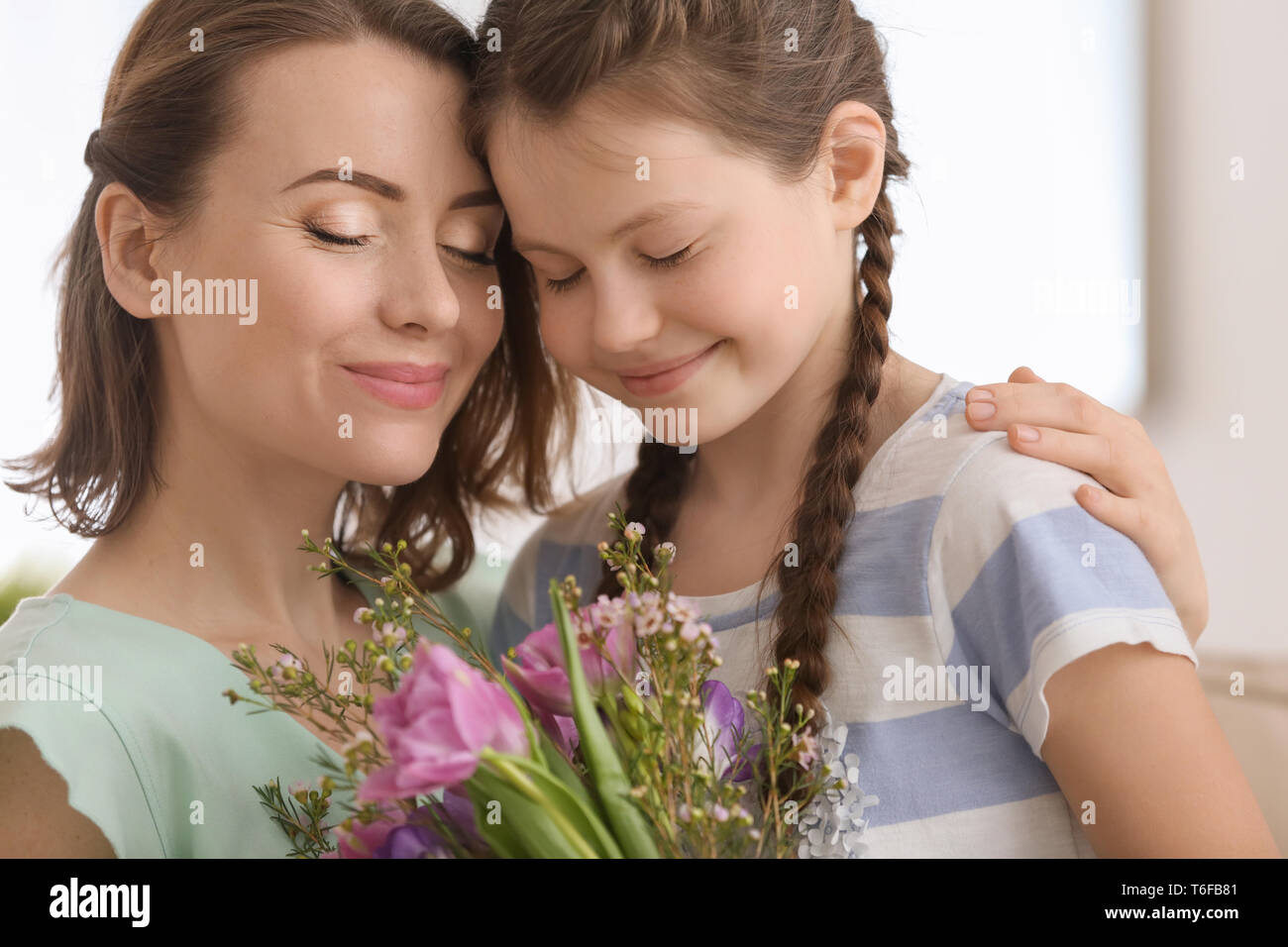 Girl greeting mother hi-res stock photography and images - Alamy