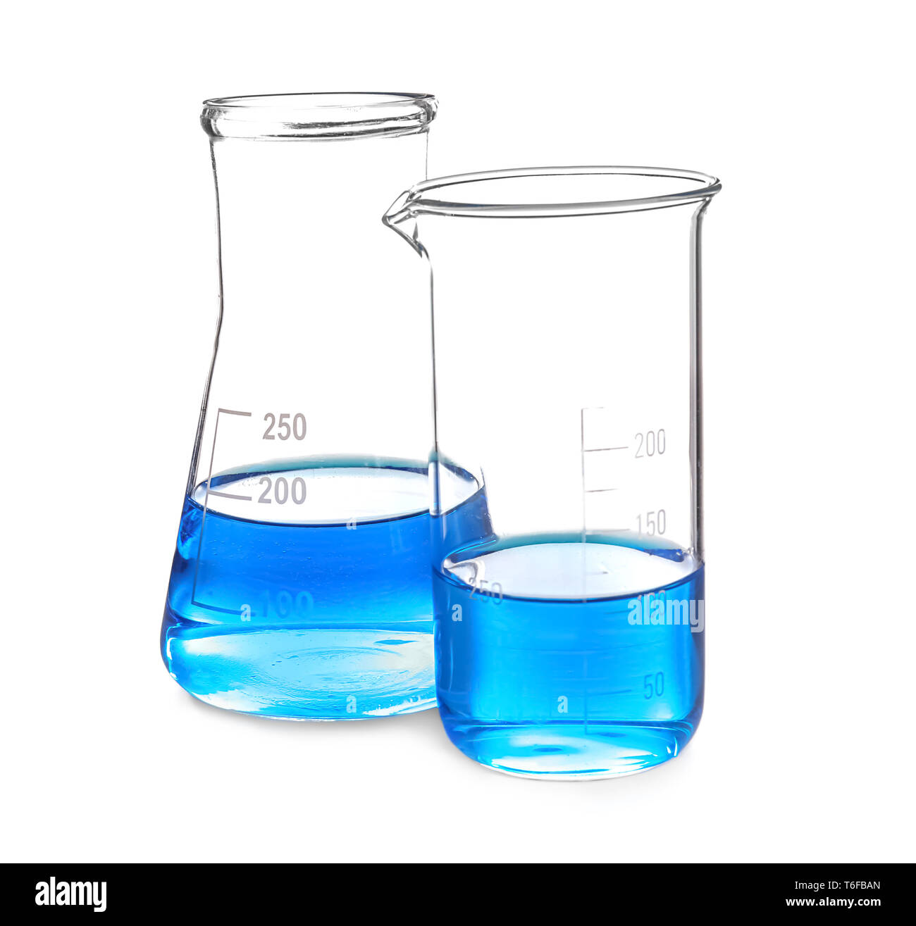Laboratory glassware with blue liquid on white background Stock Photo ...