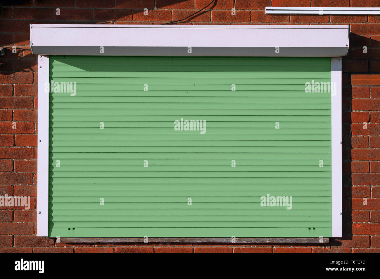 Green steel shutters closed hi-res stock photography and images - Alamy