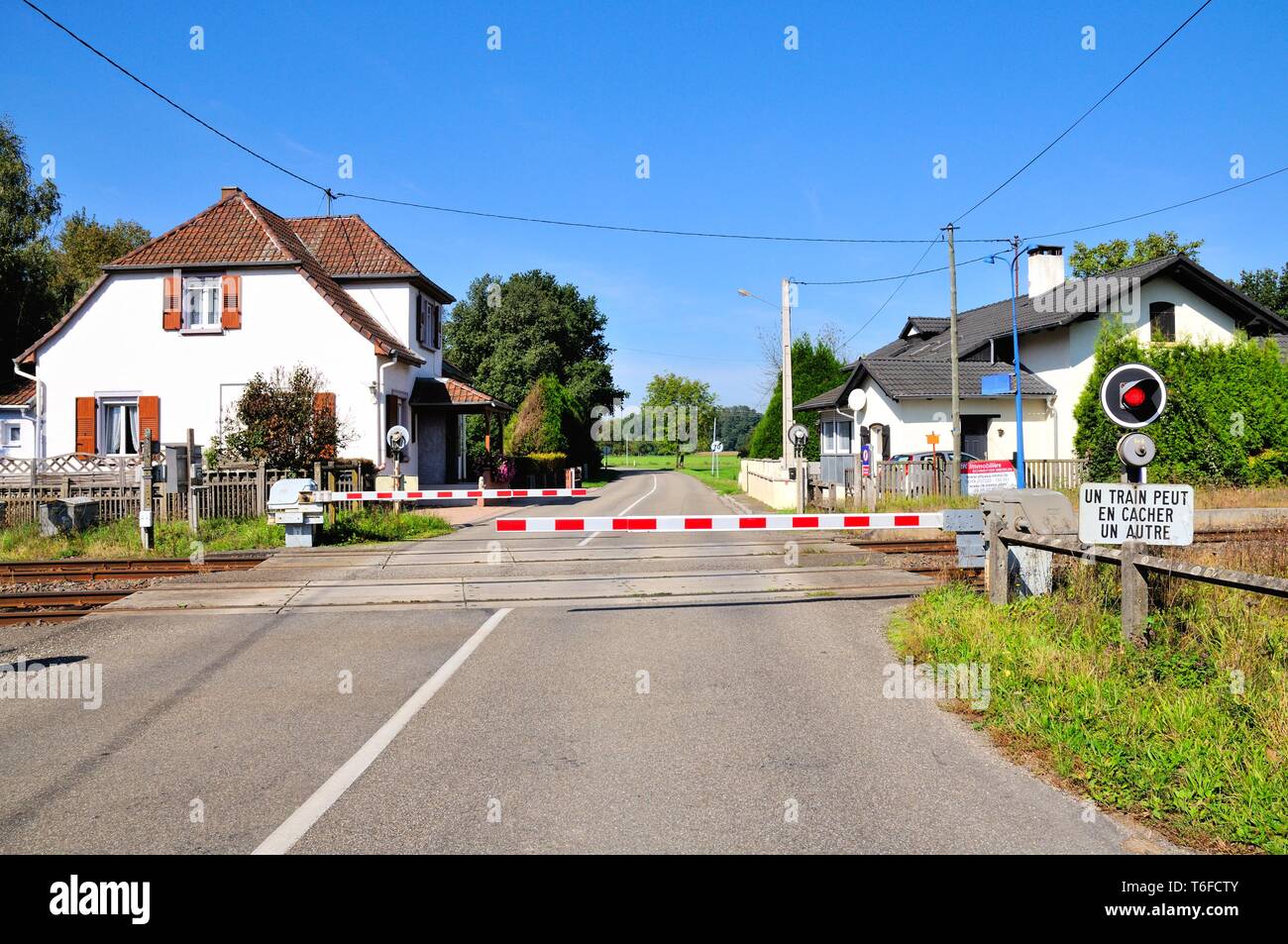 Railroad crossing Beinheim Alsace France Stock Photo - Alamy