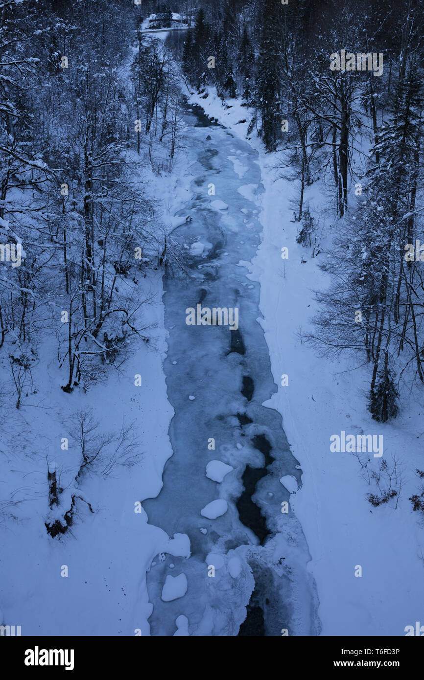 Stream in winter landscape Stock Photo - Alamy