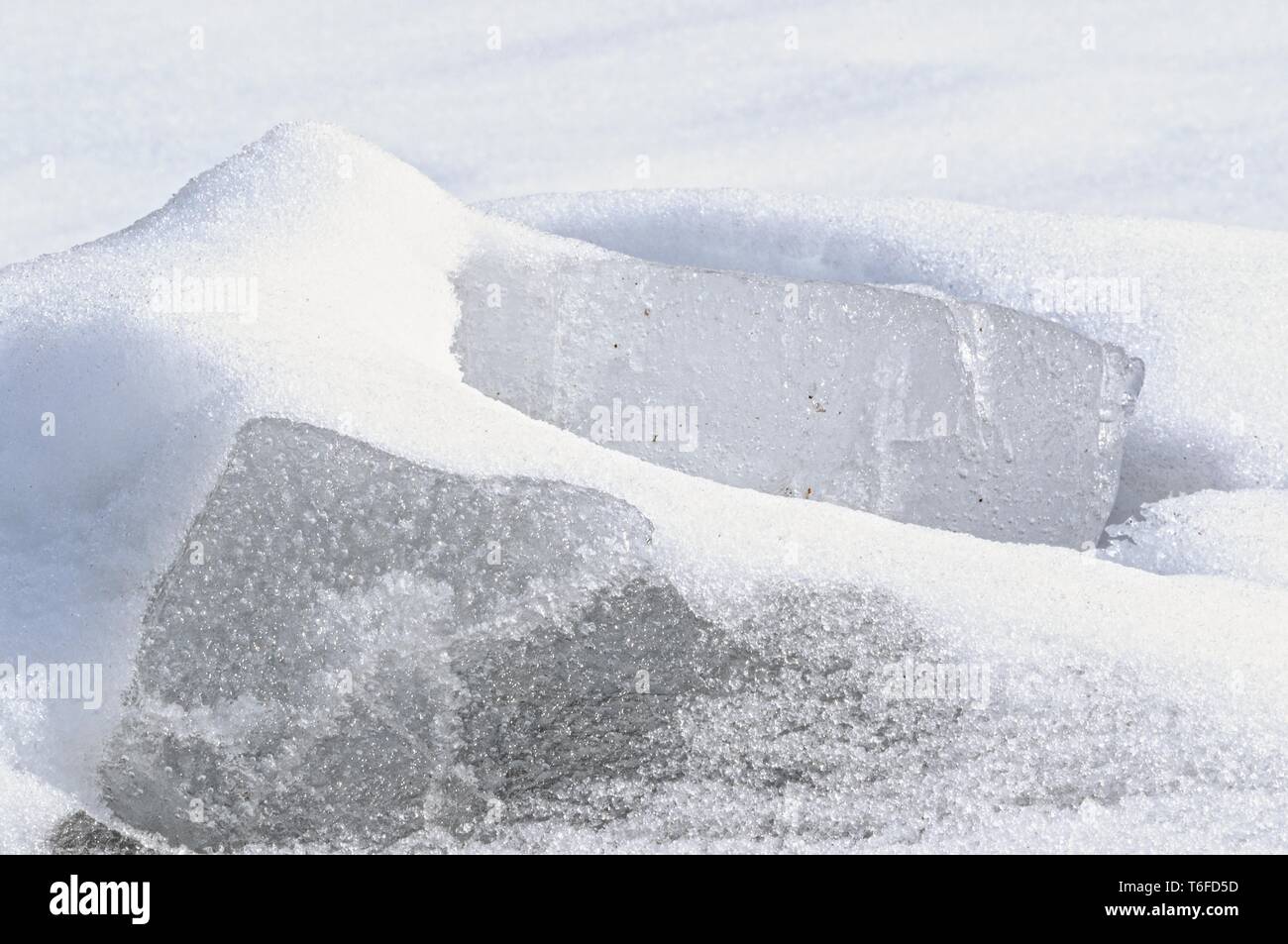 Covered with snow ice plates Stock Photo - Alamy