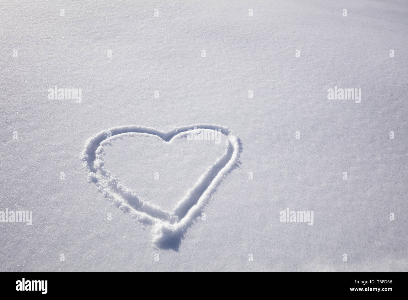 Heart snow snow in hi-res stock photography and images - Alamy