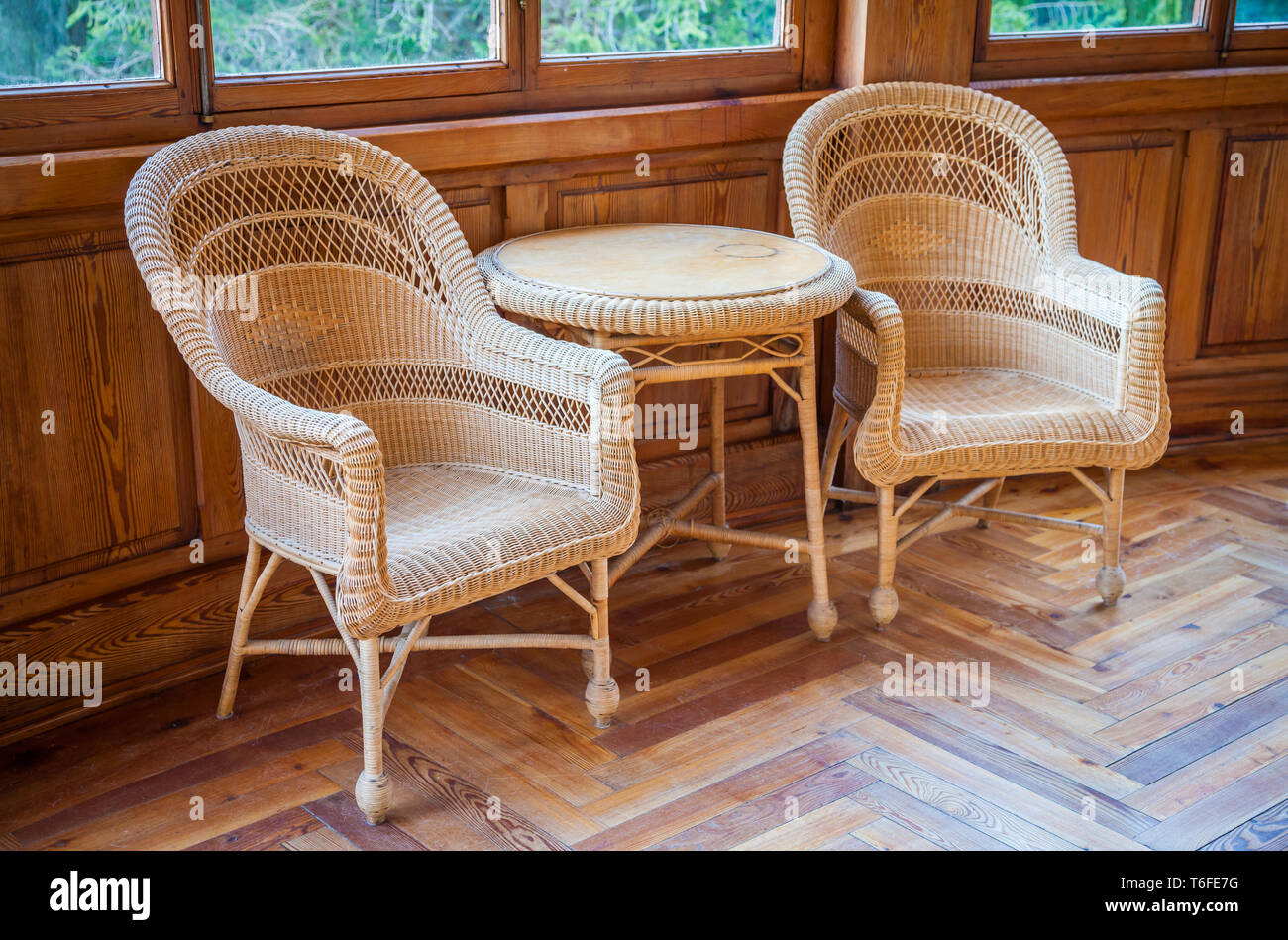 Old wicker chairs Stock Photo - Alamy