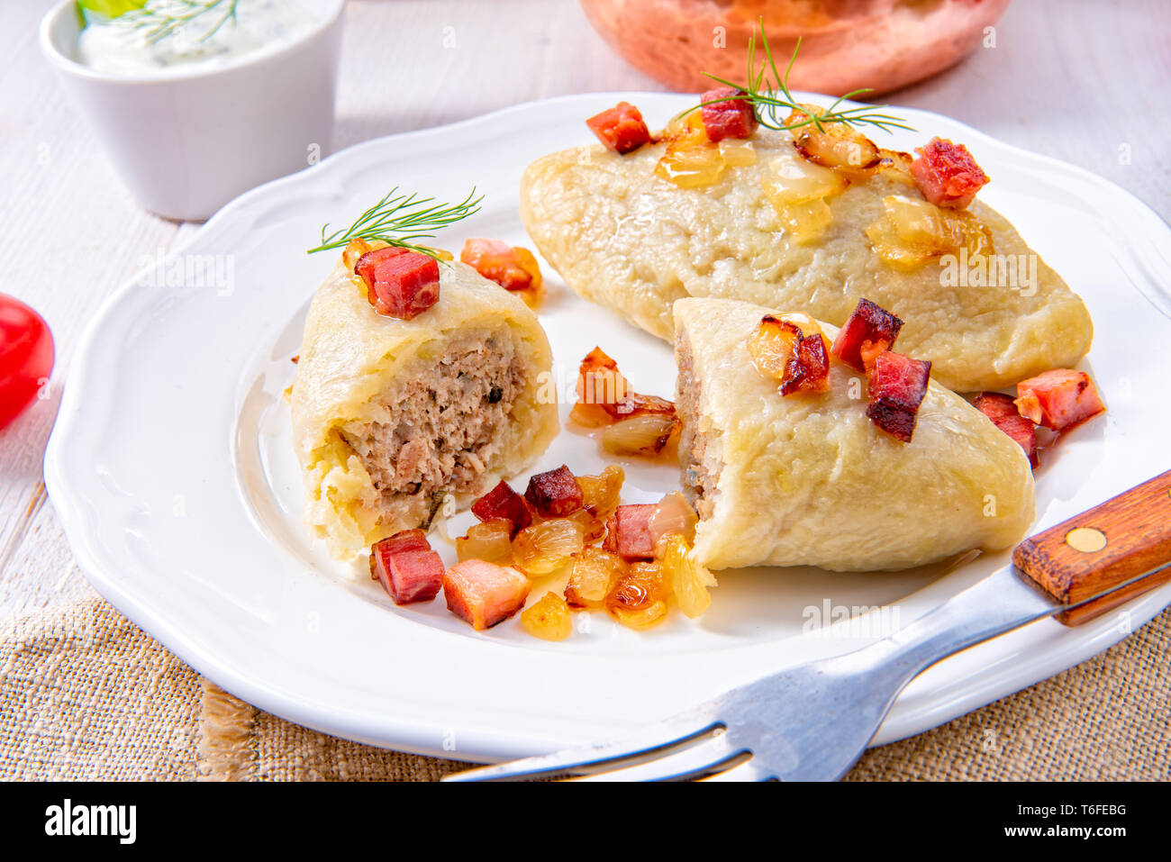 Rustic Cepelinai, a specialty Lithuanian and Polish cuisine Stock Photo ...