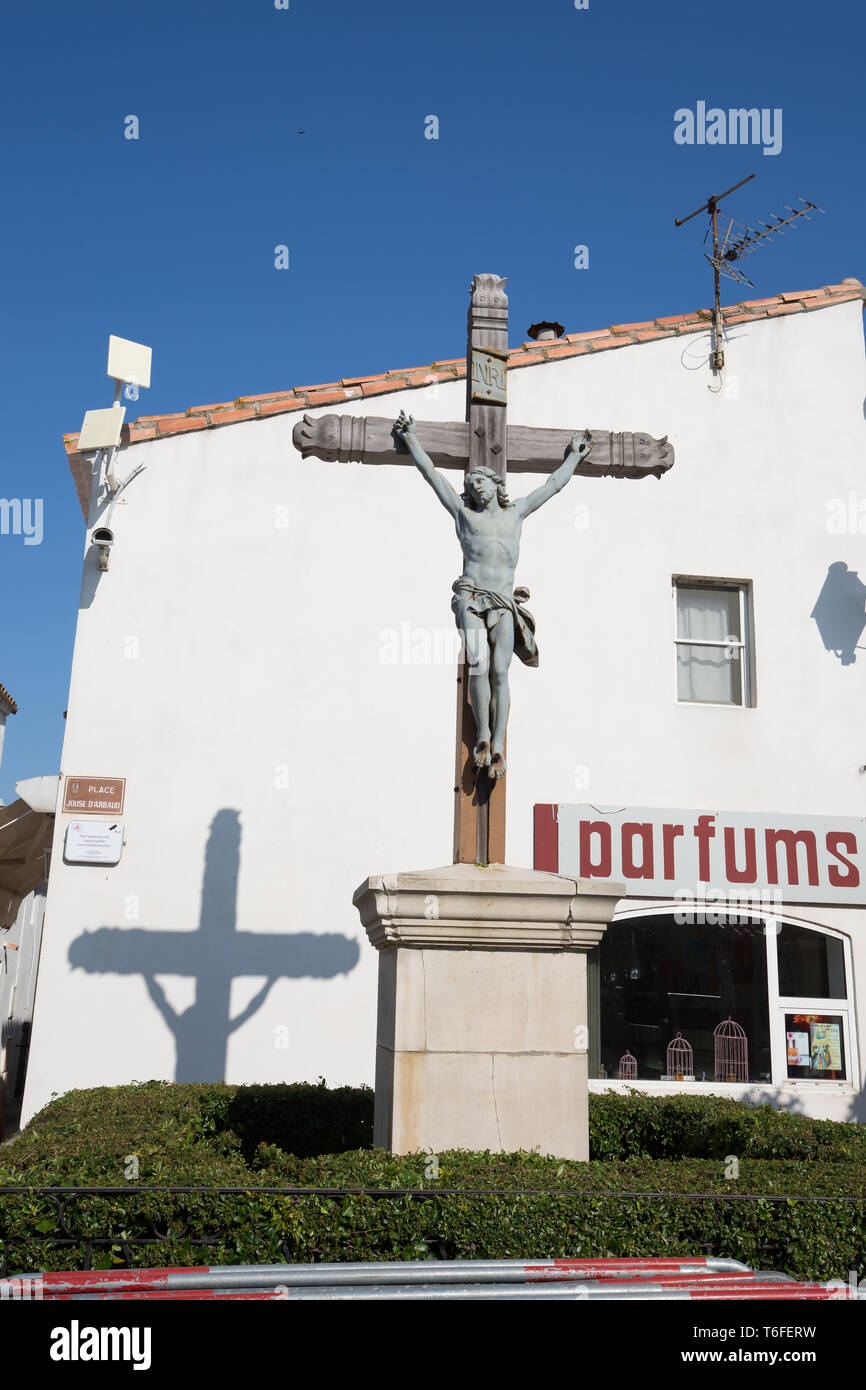 Huge crucifix on a pedestal Stock Photo - Alamy