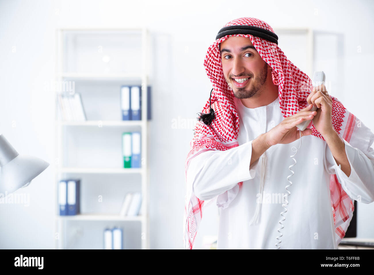 Arab businessman working in the office Stock Photo - Alamy